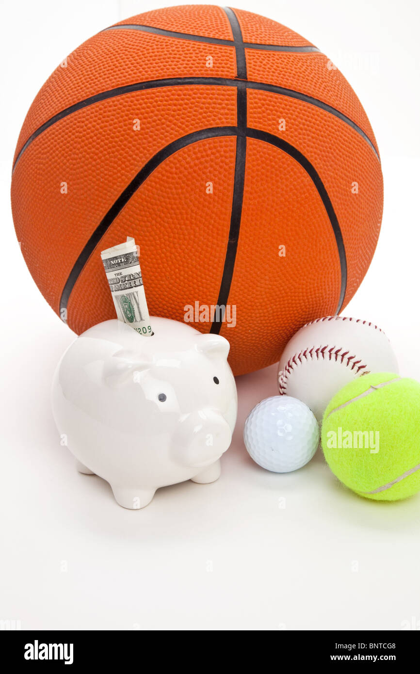 Piggy Bank and balls, concept of sport fund Stock Photo - Alamy