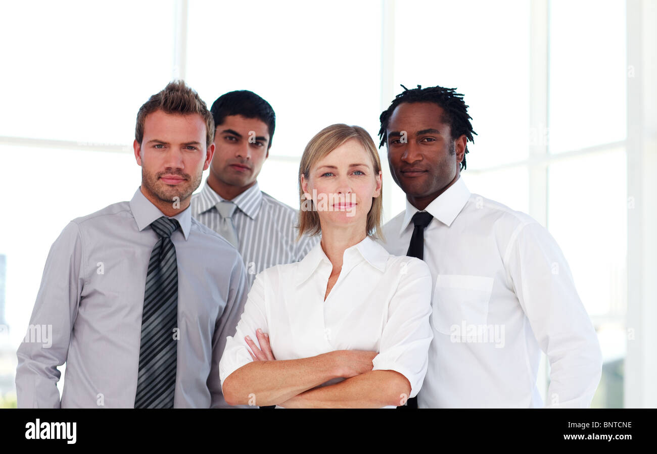 Confident business team looking at the camera Stock Photo - Alamy