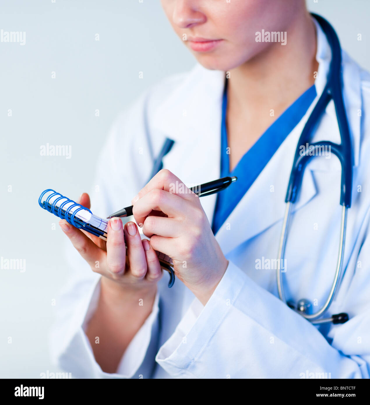 Doctor writing a prescription Stock Photo - Alamy