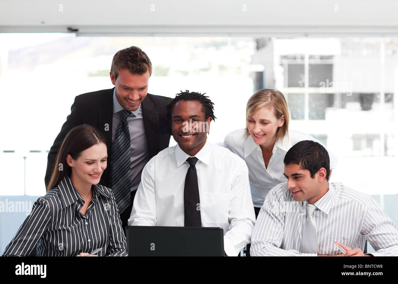 Business team in an office Stock Photo - Alamy