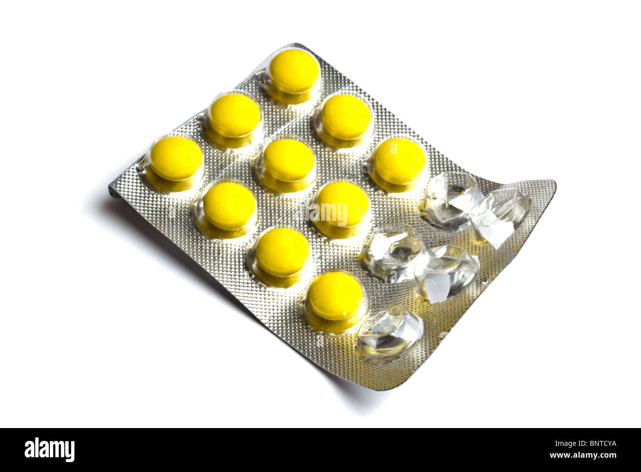 Package of Yellow Pills isolated on white background Stock Photo - Alamy