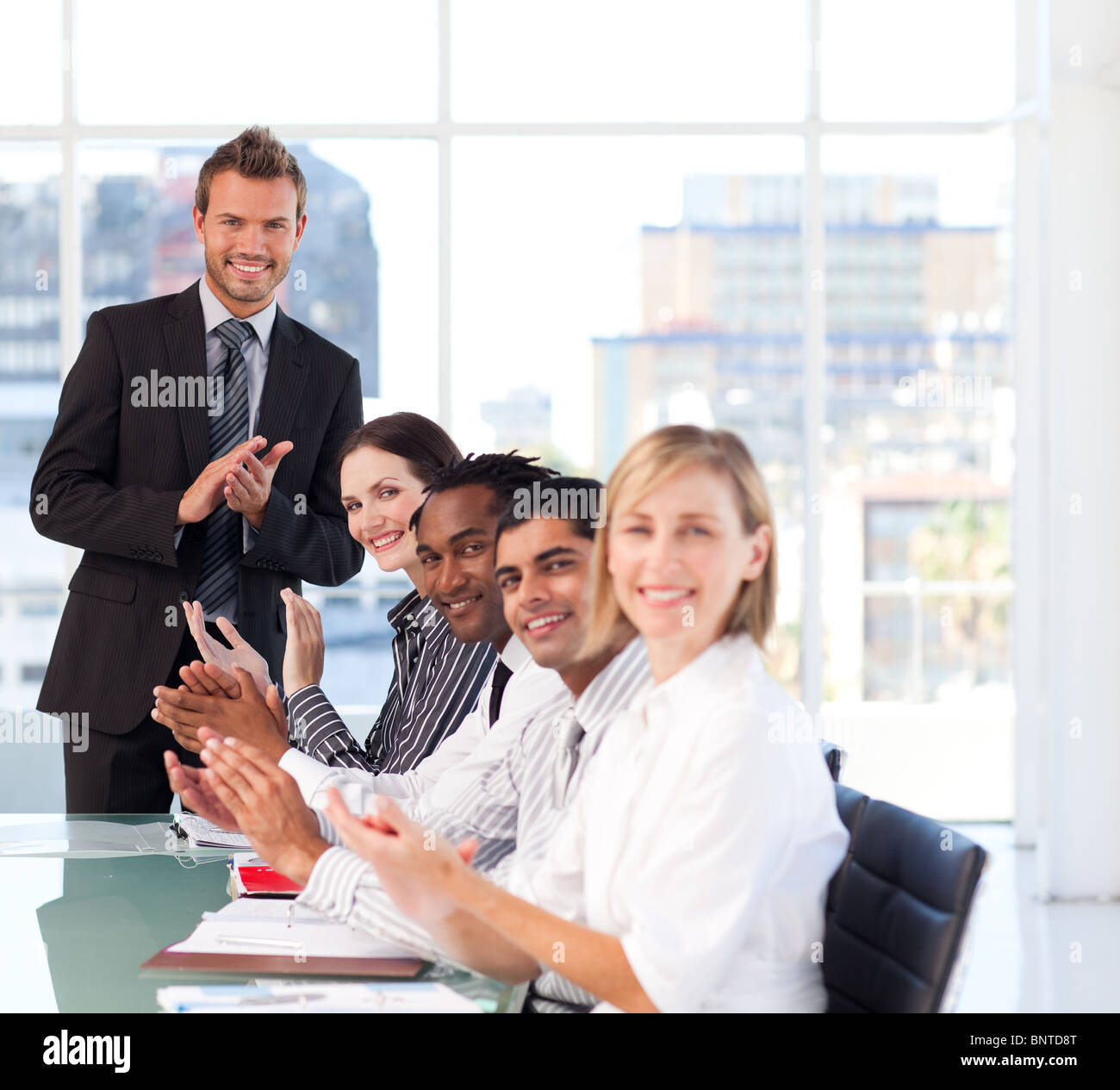 Businessman having success in a meeting Stock Photo - Alamy