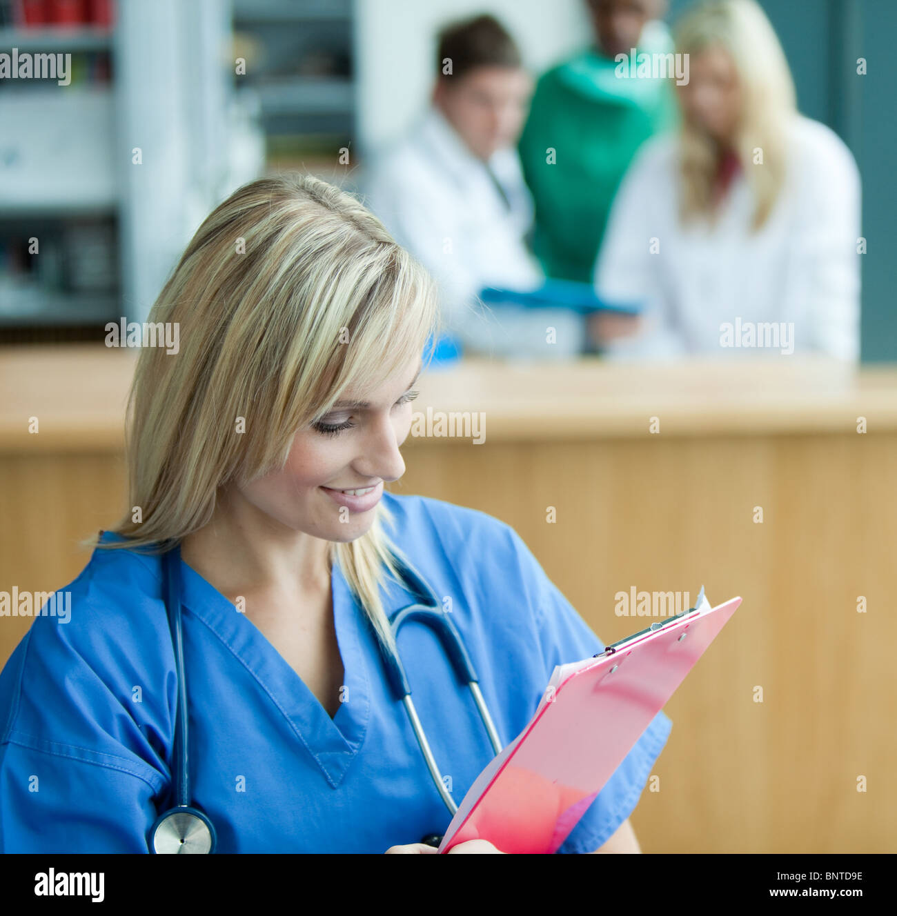 Smiling female doctor looking at the camera Stock Photo - Alamy