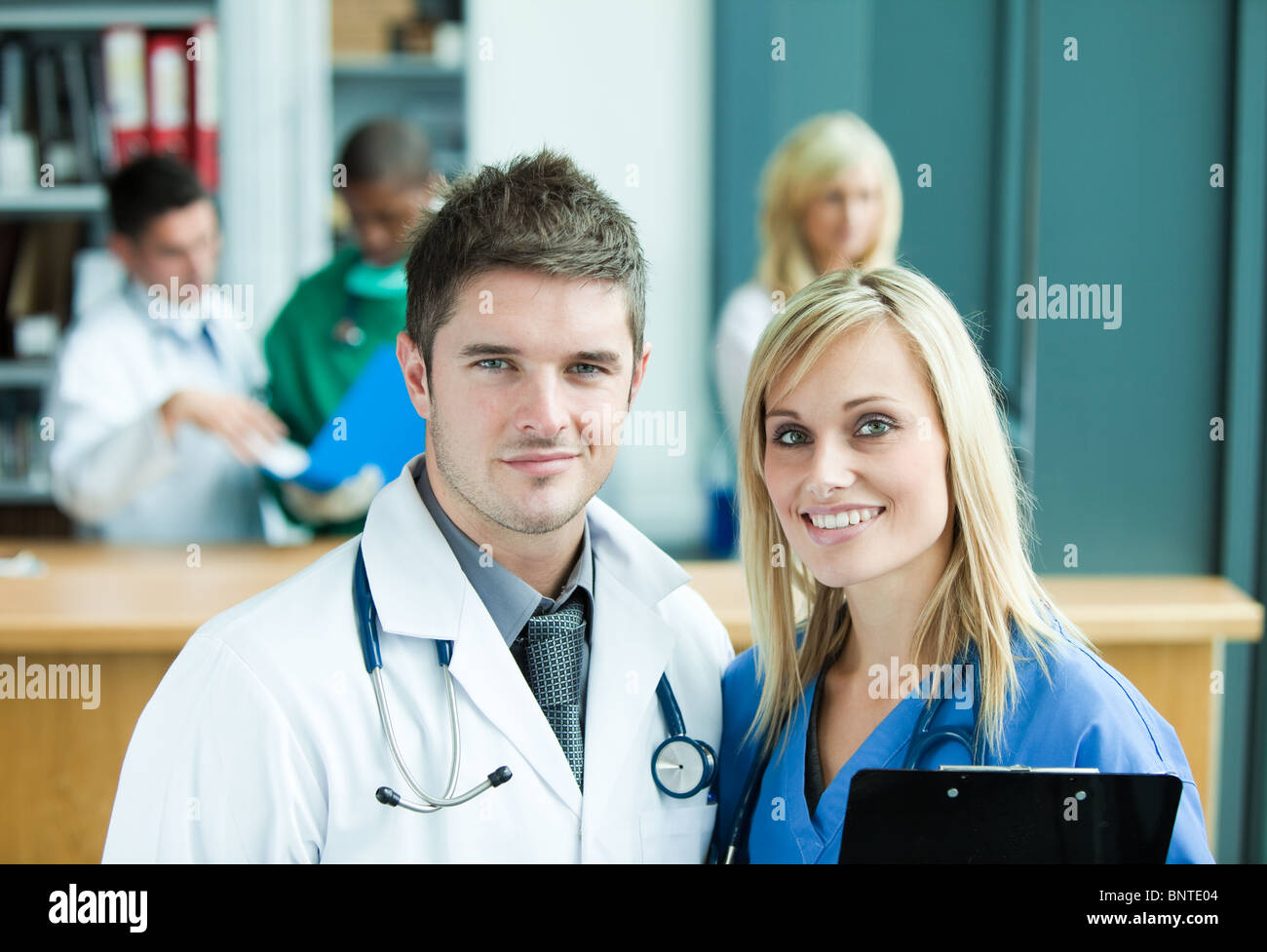 Doctors reading a document in hospital Stock Photo - Alamy