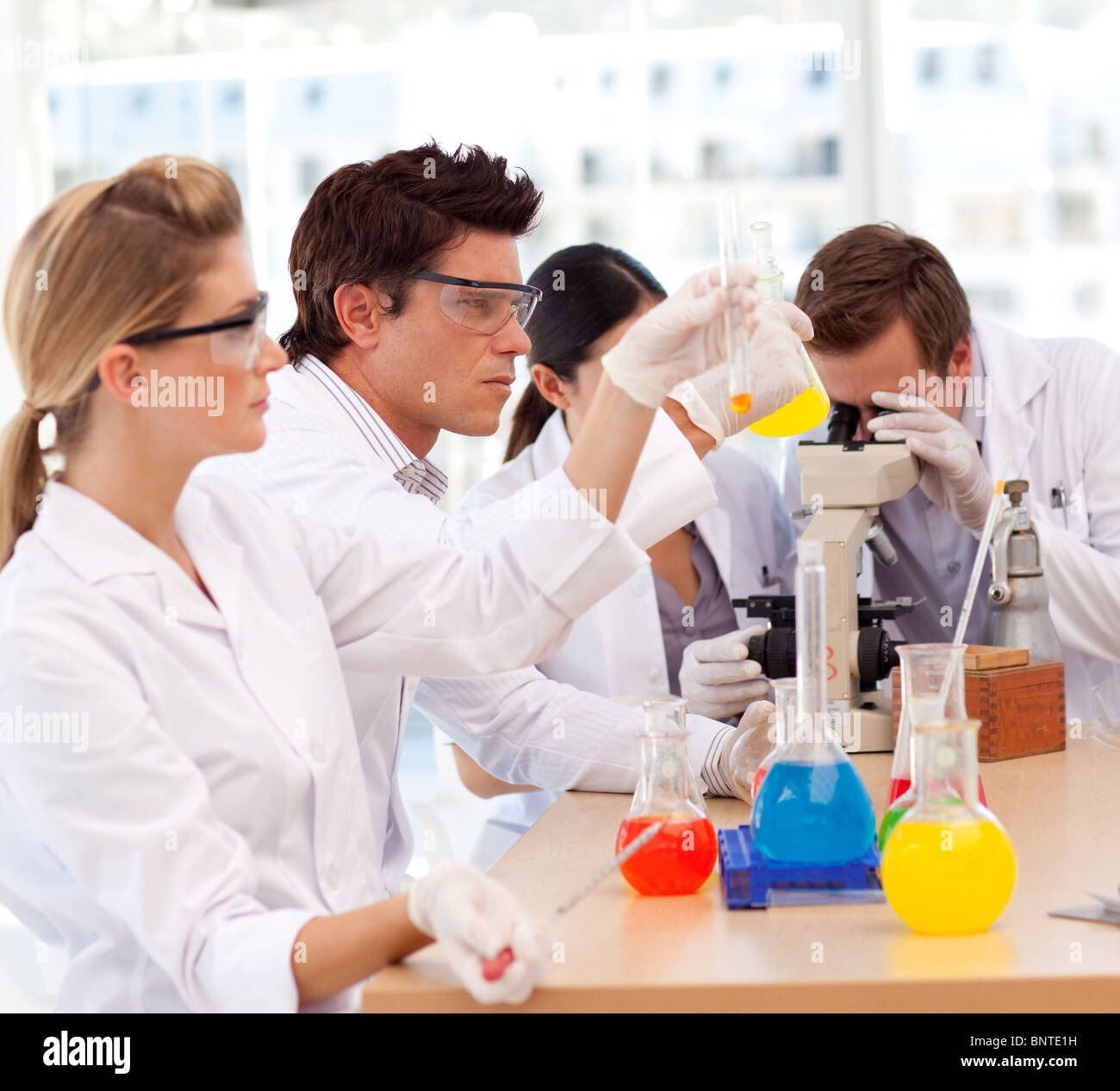 Scientists working in a laboratory Stock Photo - Alamy