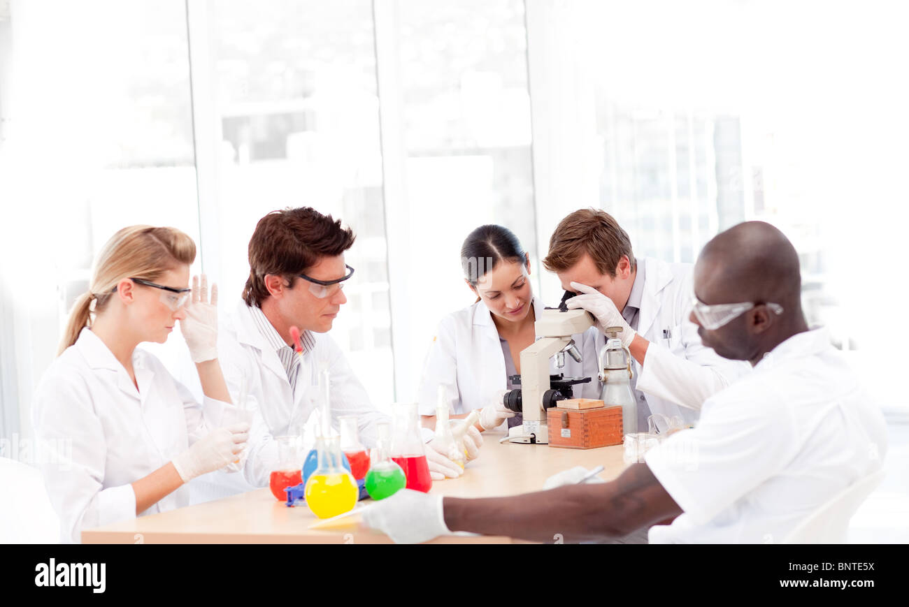 Scientists work research in laboratory hi-res stock photography and ...