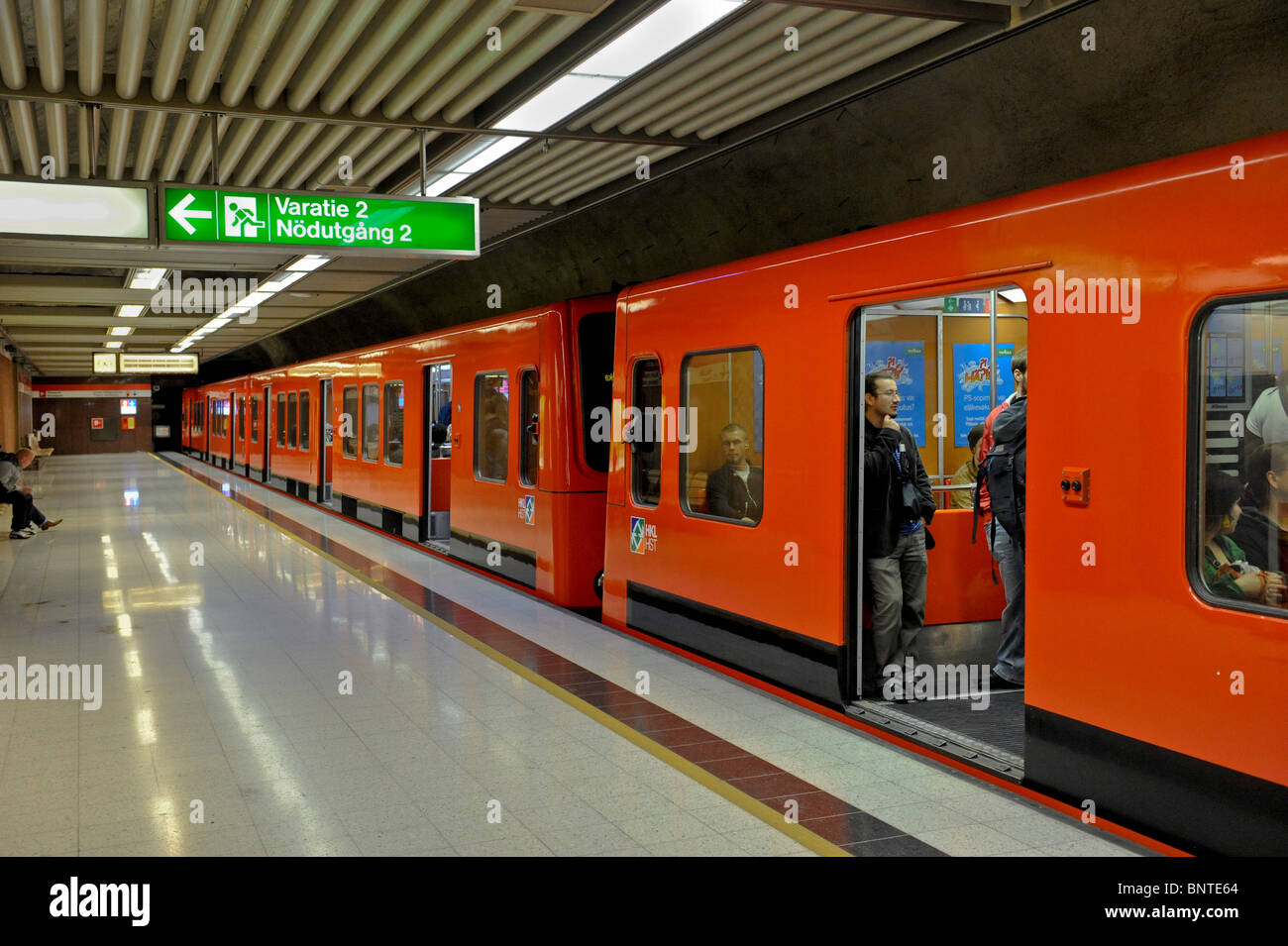 Helsinkis single line underground train at a station Stock Photo - Alamy