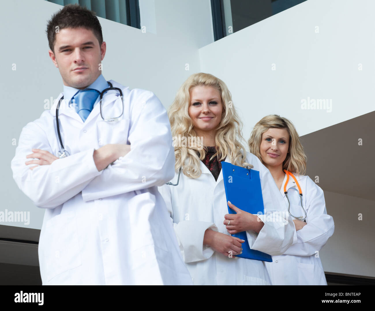 Three doctors in a hospital Stock Photo - Alamy