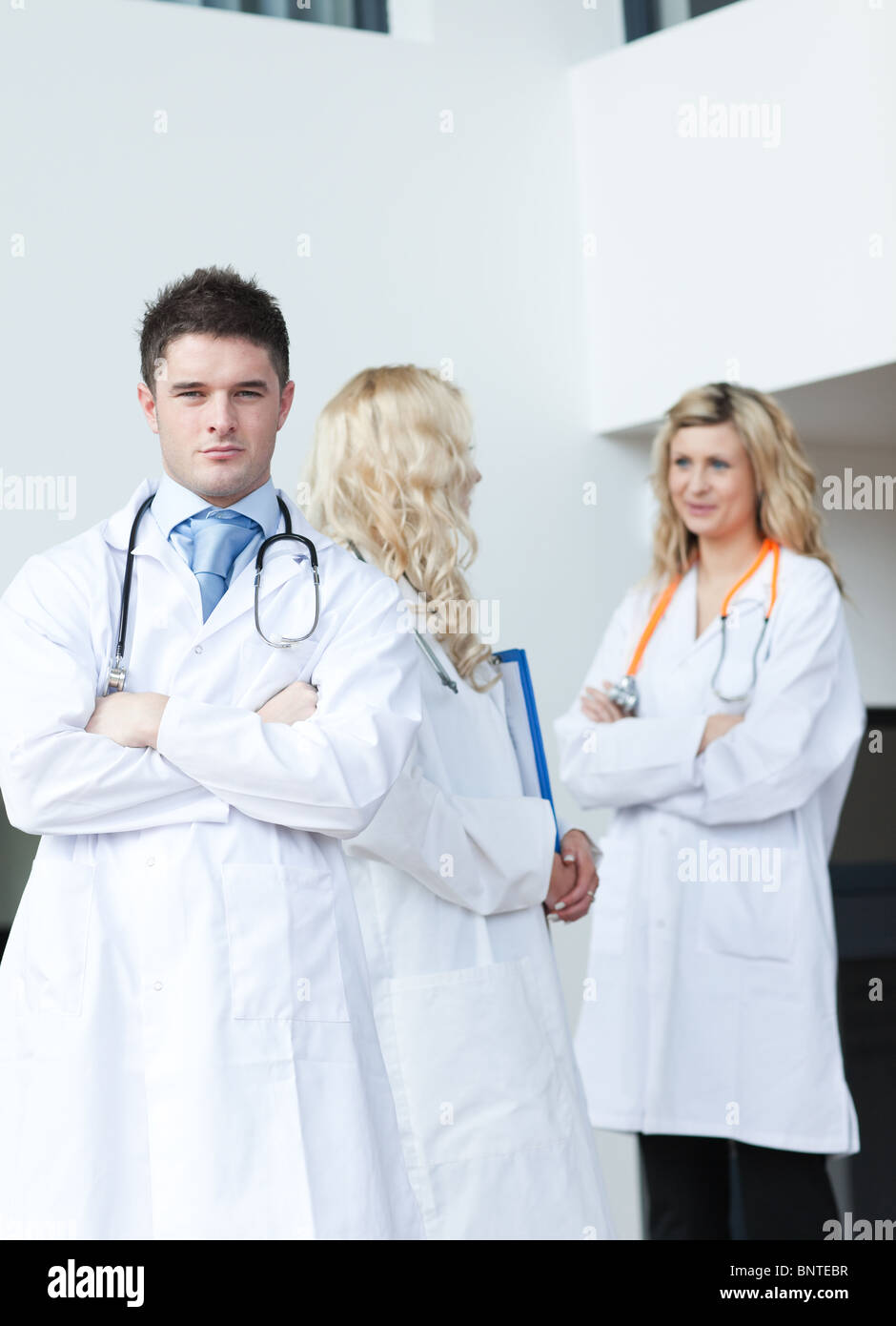 Three doctors in a hospital Stock Photo - Alamy