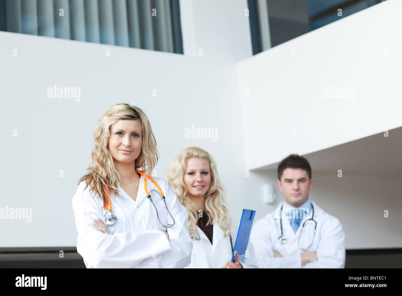 Three doctors in a hospital Stock Photo - Alamy