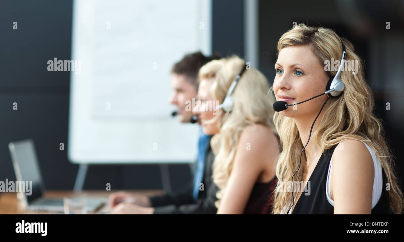 Cute business team working together Stock Photo - Alamy