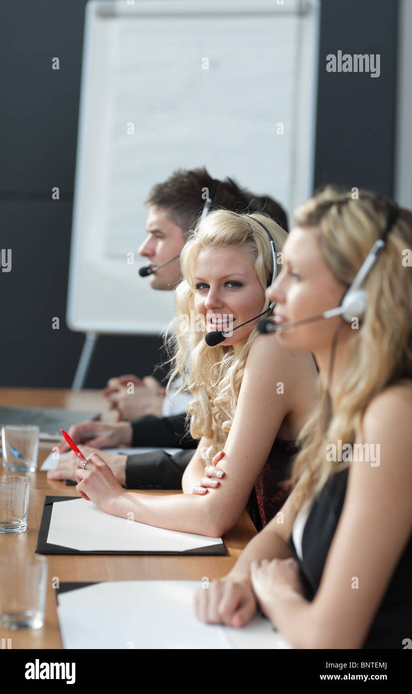 Serious business team working together Stock Photo - Alamy