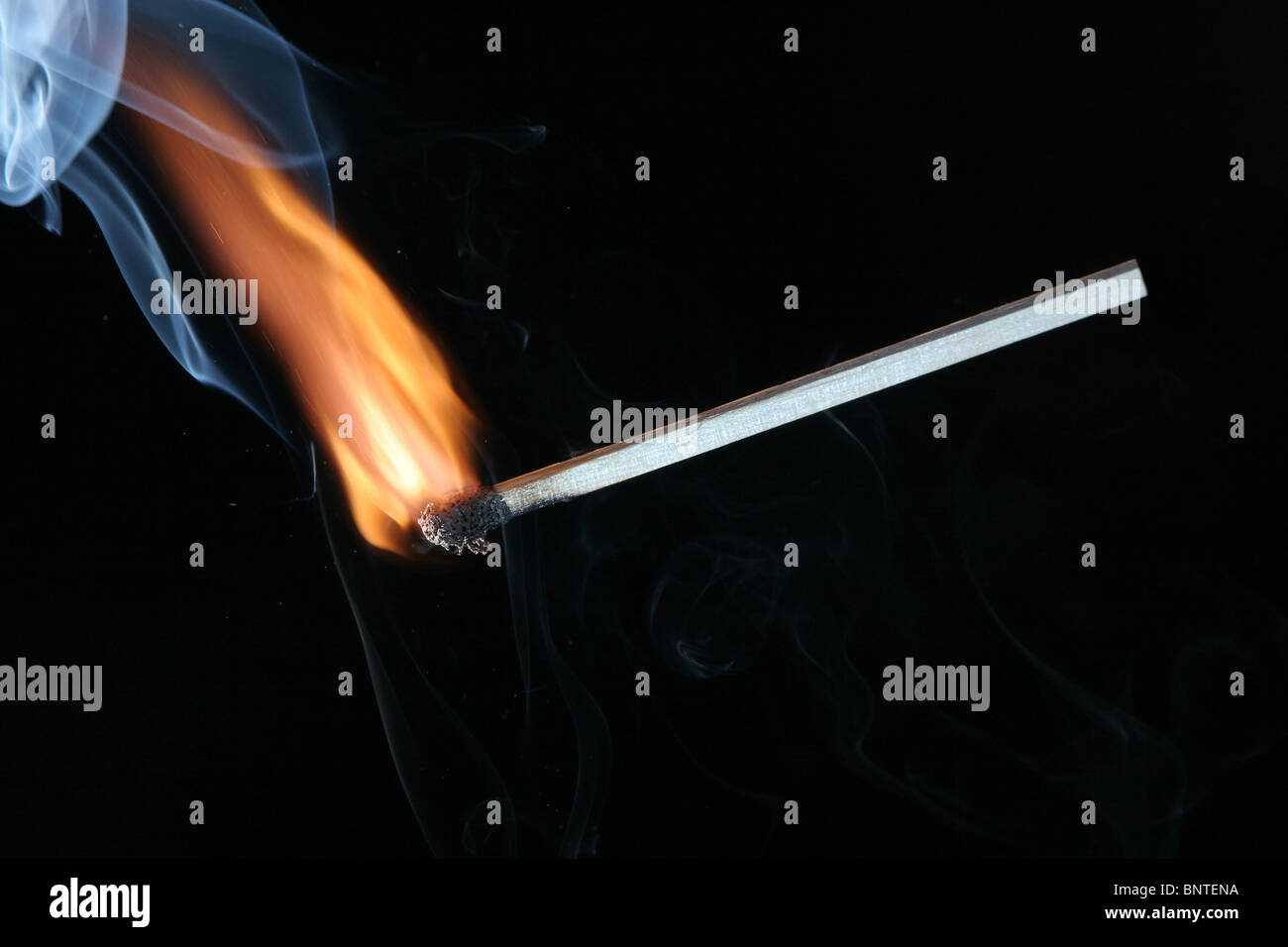 A burning match Stock Photo - Alamy