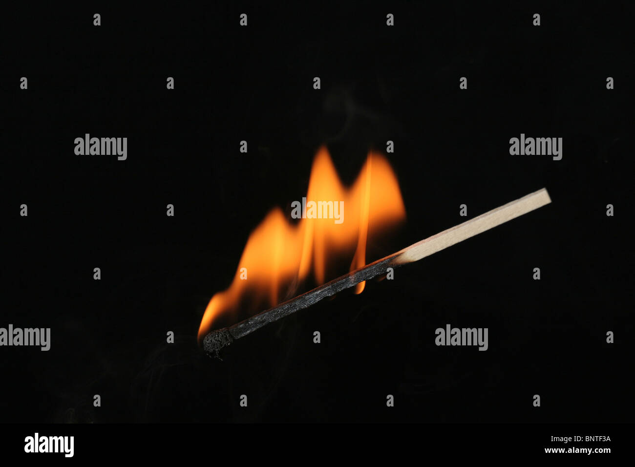 A burning match Stock Photo - Alamy