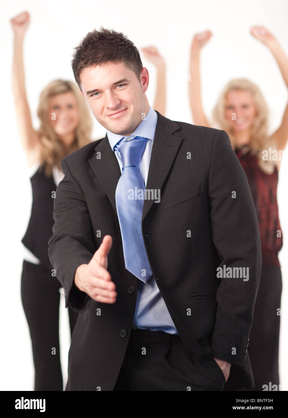 Businessman offering a handshake Stock Photo - Alamy