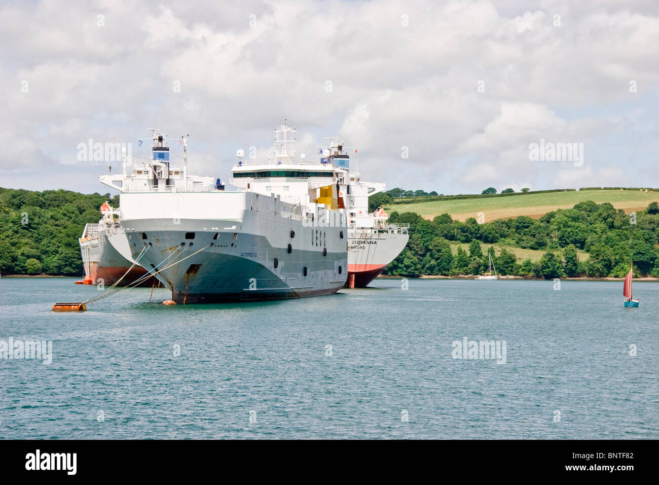 Container ships moored on the River Fal, Cornwall, England Stock Photo ...