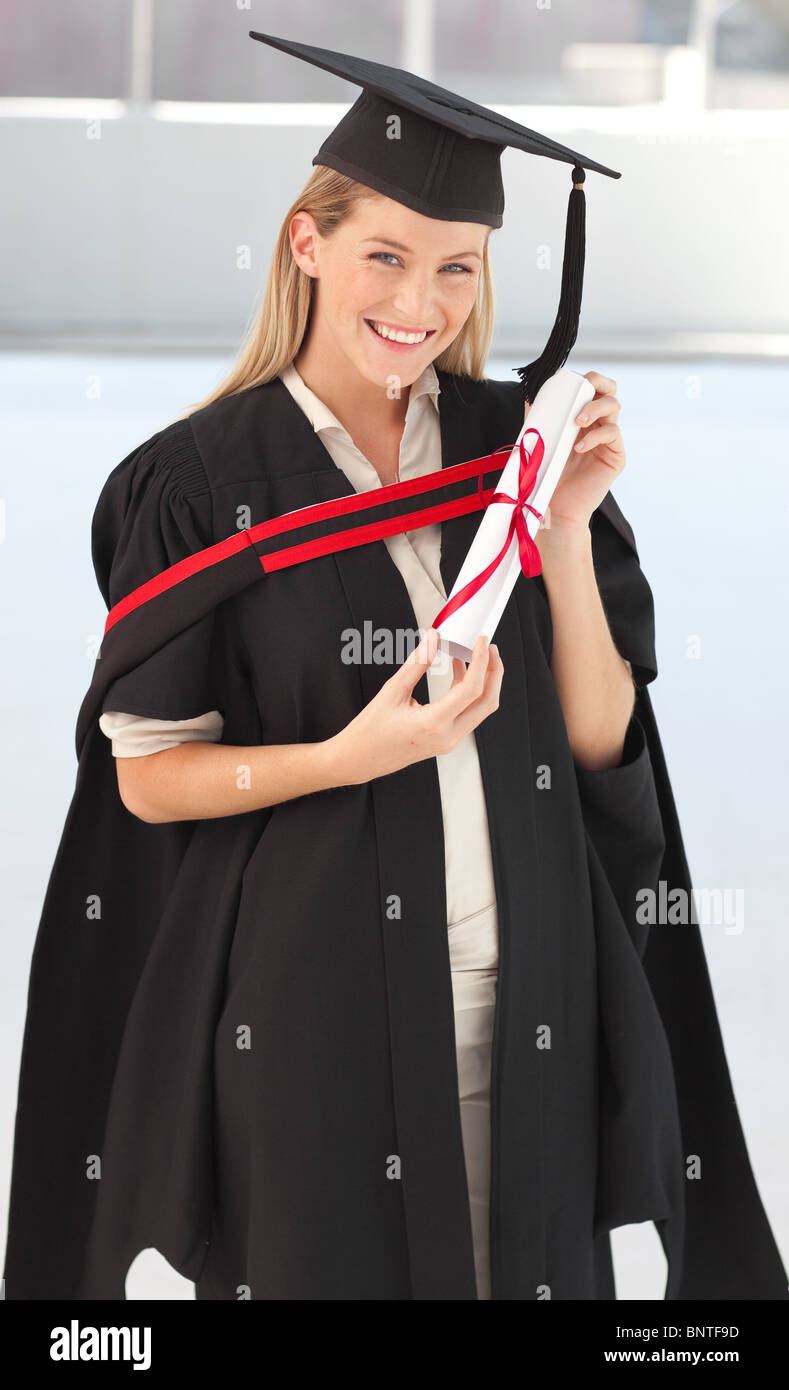 Woman smiling at her graduation Stock Photo - Alamy