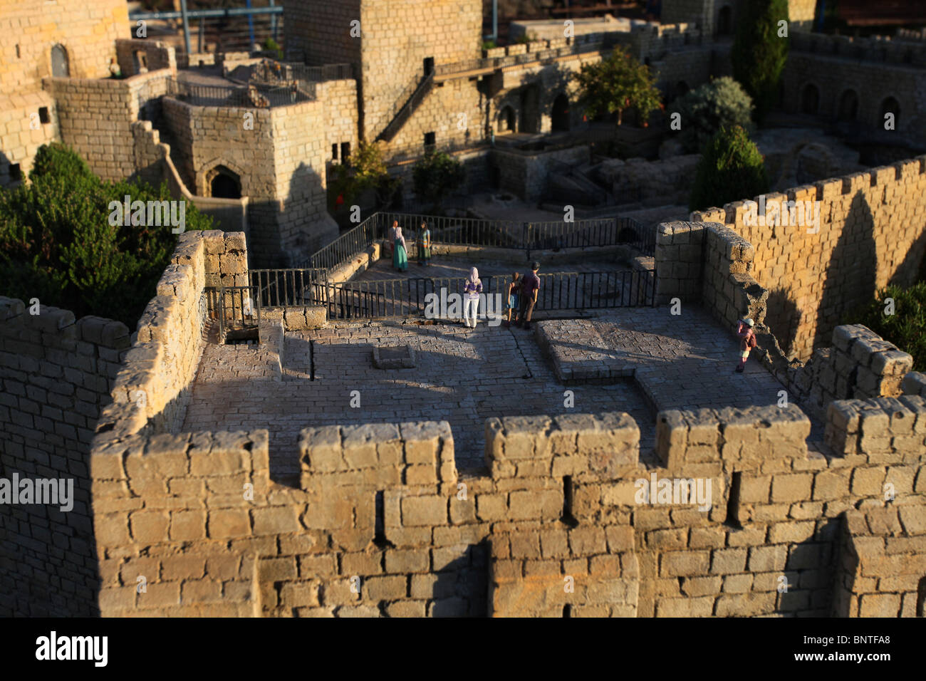 Figurines of tourists within a miniature replica of David citadel in ...