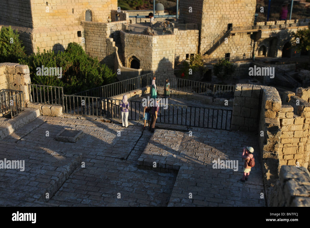 Figurines of tourists within a miniature replica of David citadel in ...