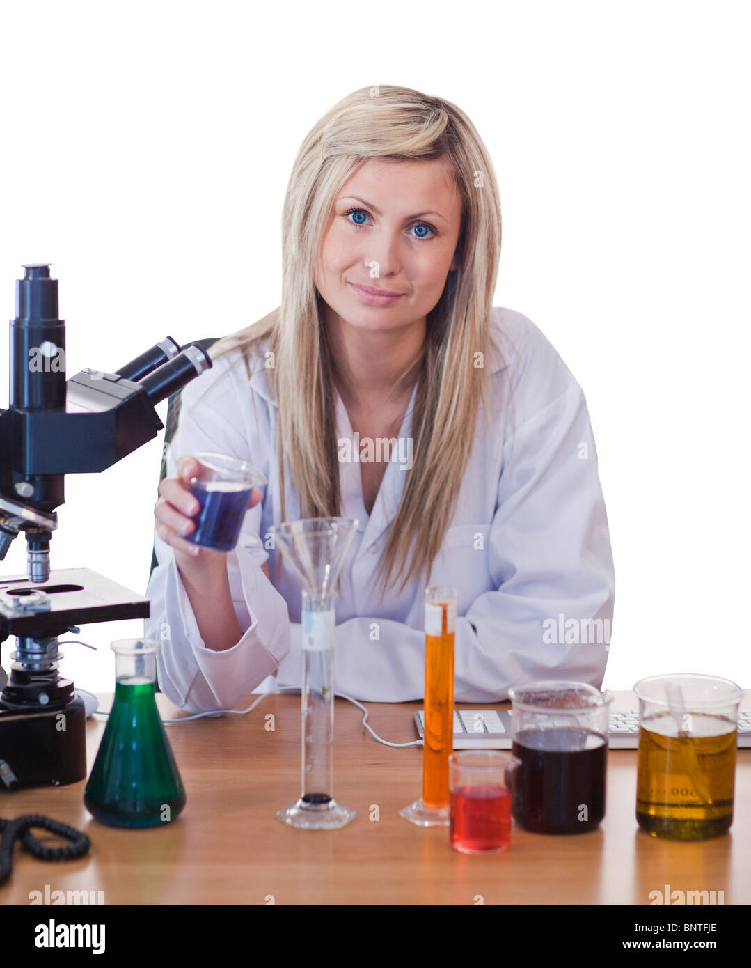 Woman scientist conducting experiment Stock Photo - Alamy