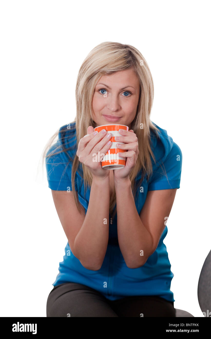 woman drinking from a mug Stock Photo - Alamy