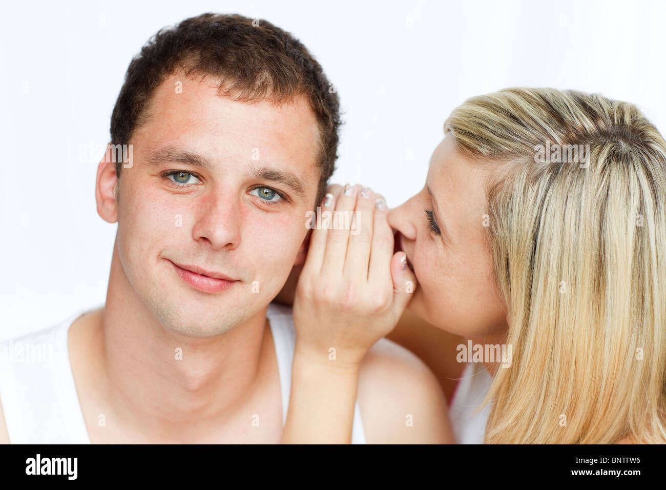 Woman telling a man something important Stock Photo - Alamy