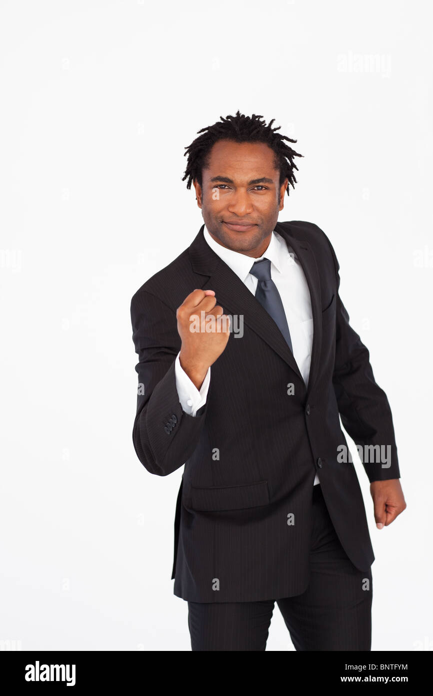 Serious businessman with fist Stock Photo - Alamy