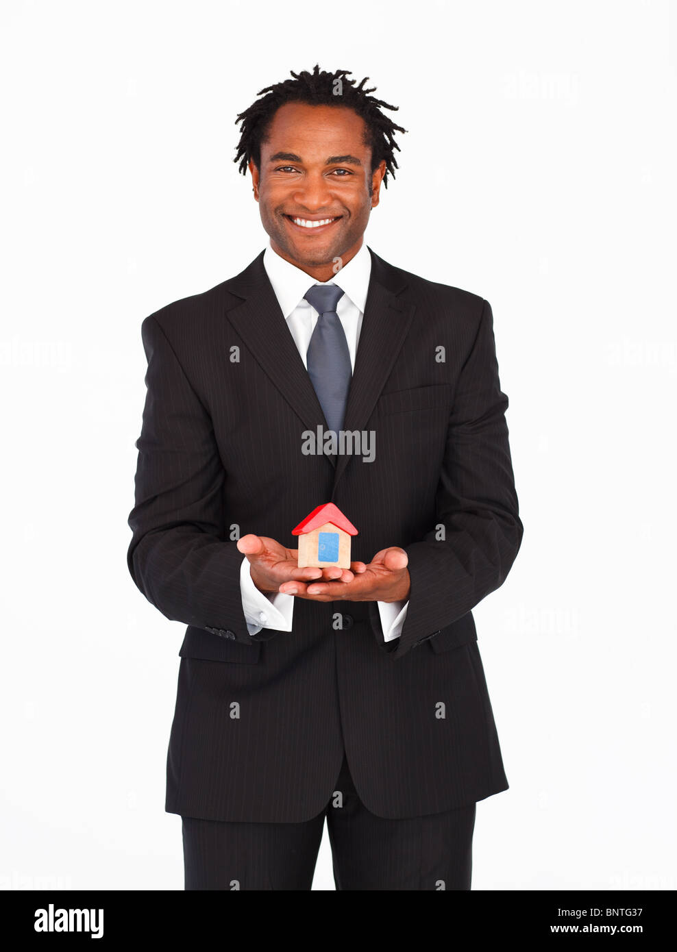 Businessman presenting housing solution Stock Photo - Alamy