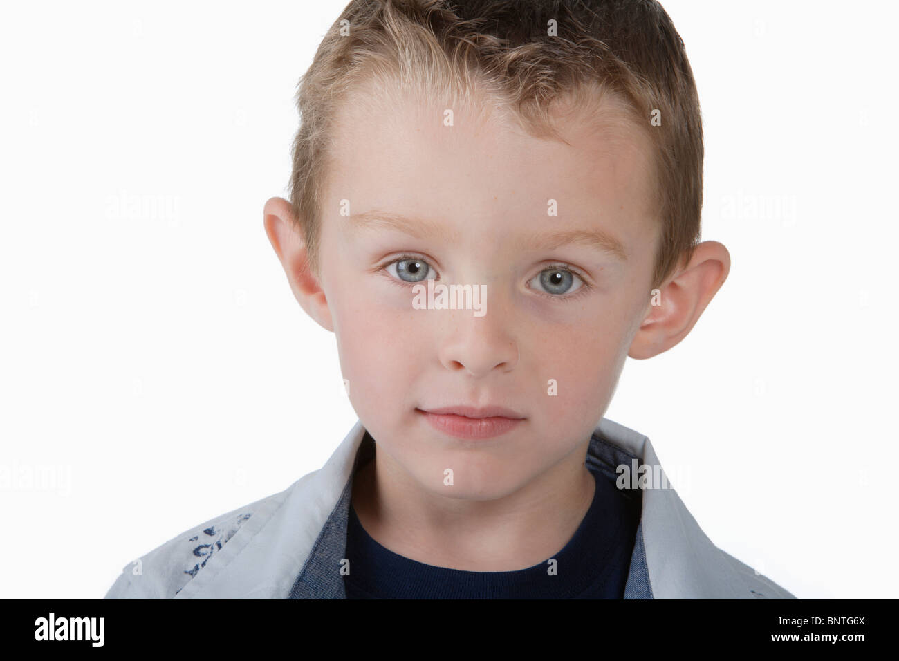 Close-up of Young Boy Looking into Camera Stock Photo - Alamy