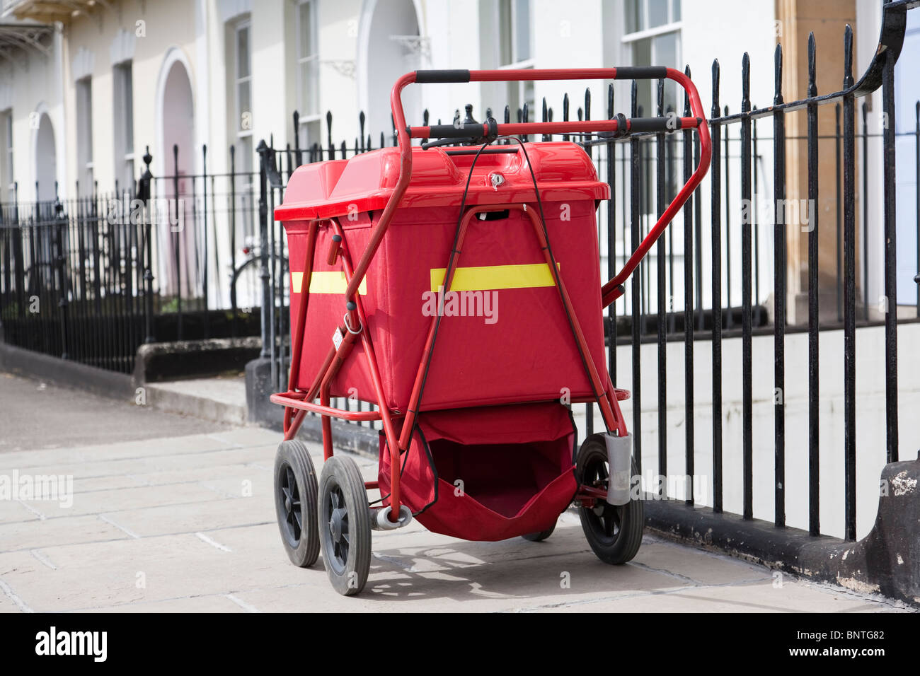 Close-up of a postman's trolley parked outside a house in Royal York ...
