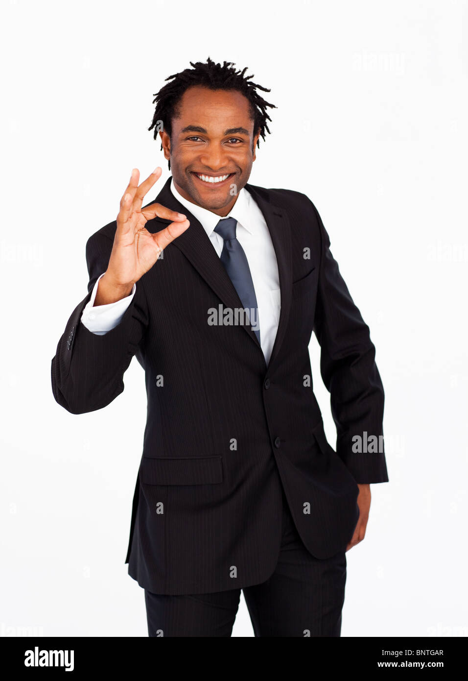 Friendly businessman showing okay sign Stock Photo - Alamy