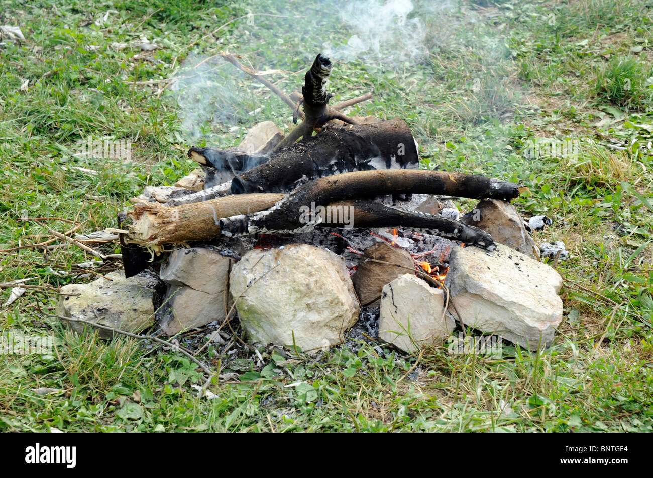 Smoldering campfire hi-res stock photography and images - Alamy