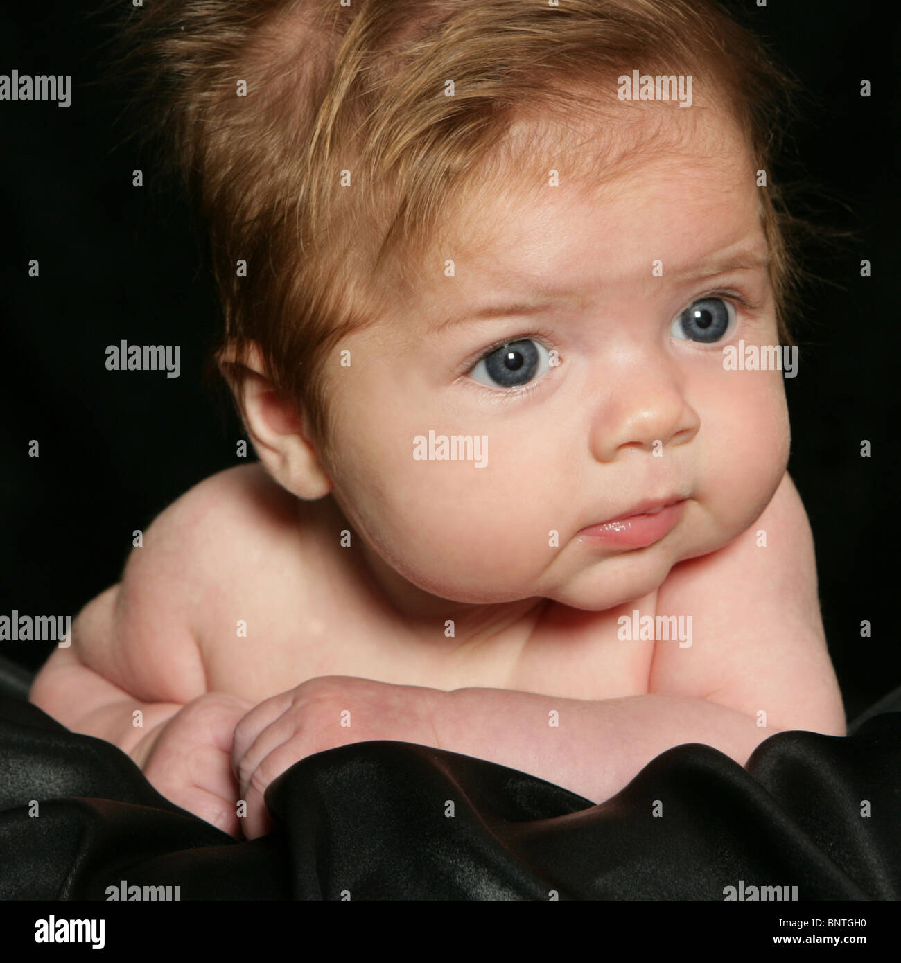 Baby face close-up redhead Stock Photo - Alamy