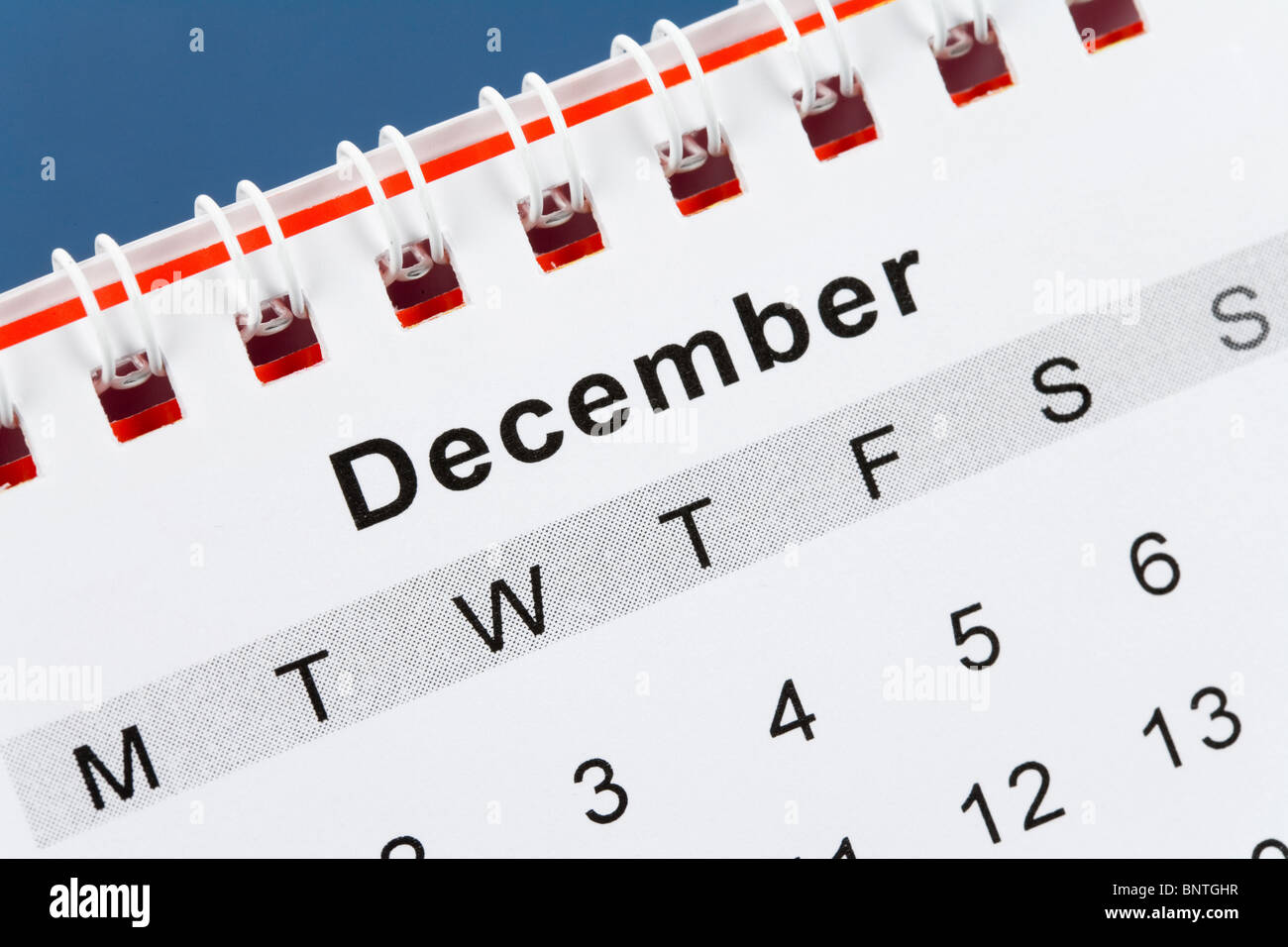Calendar December close up with blue background Stock Photo - Alamy