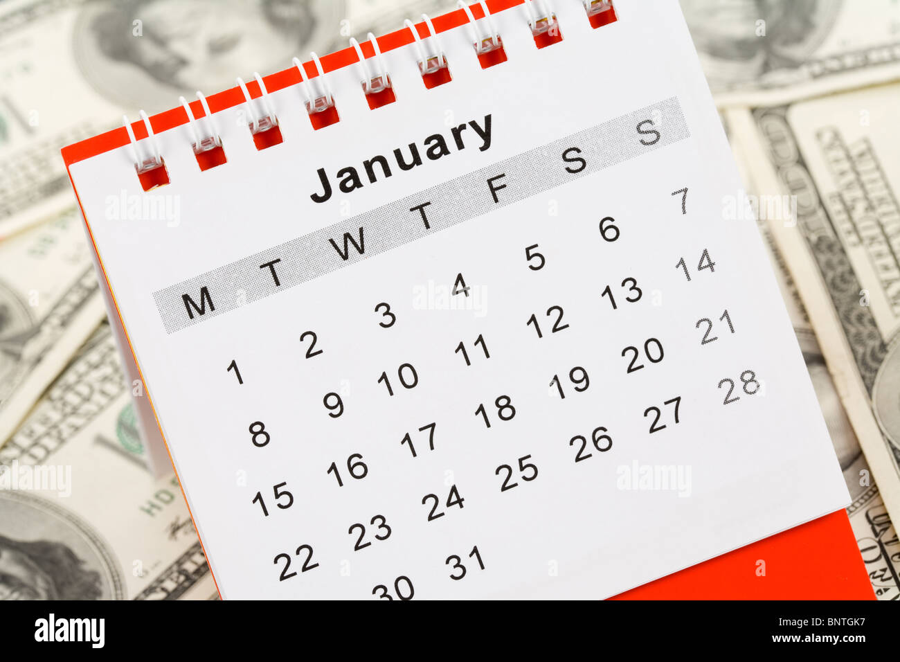 Calendar and dollar, January, New Year Stock Photo - Alamy