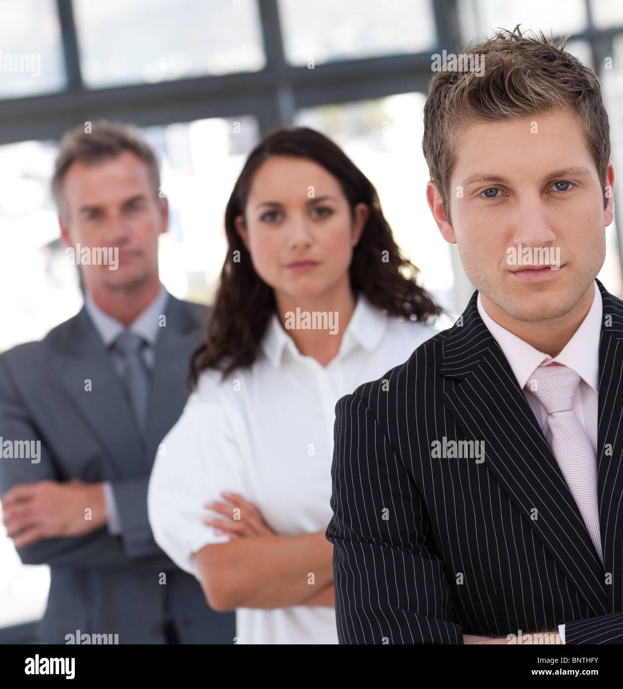 Serious business team Stock Photo - Alamy