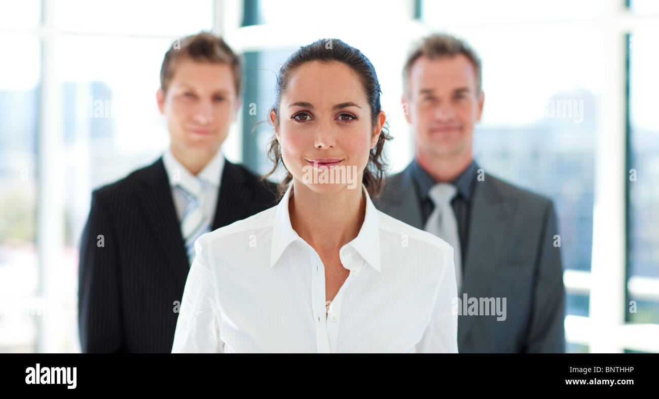 Beautiful businesswoman in front of her team Stock Photo - Alamy