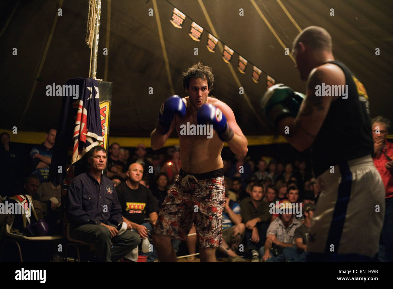 Boxers in action at Fred Brophy's boxing tent during the annual ...