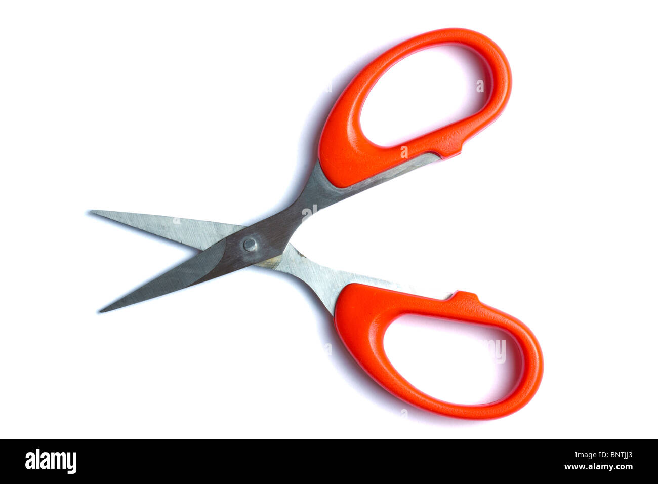 Red scissors isolated on white background Stock Photo - Alamy