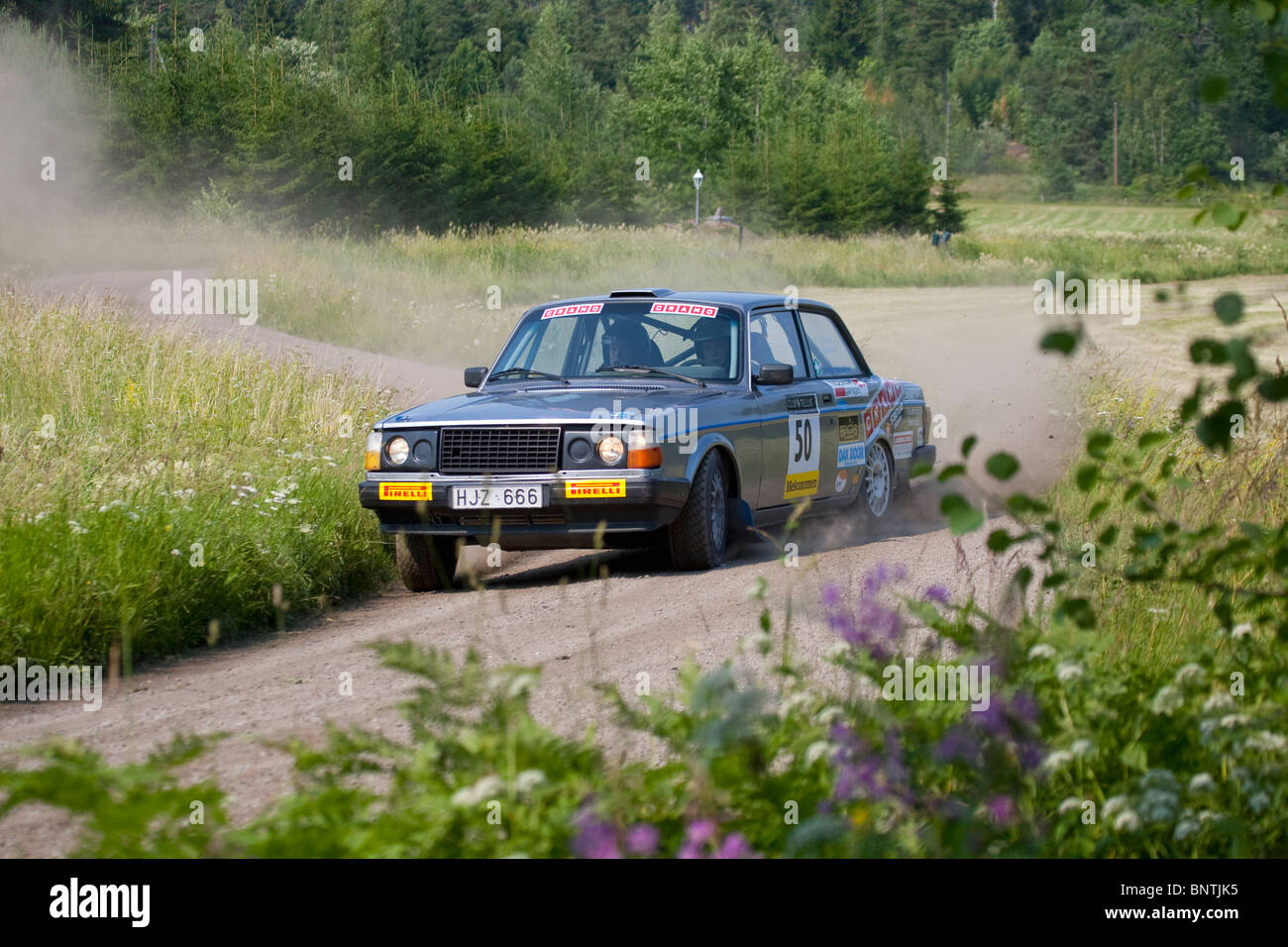 Old swedish rallycar on gravelroad ,Classic racing Stock Photo - Alamy