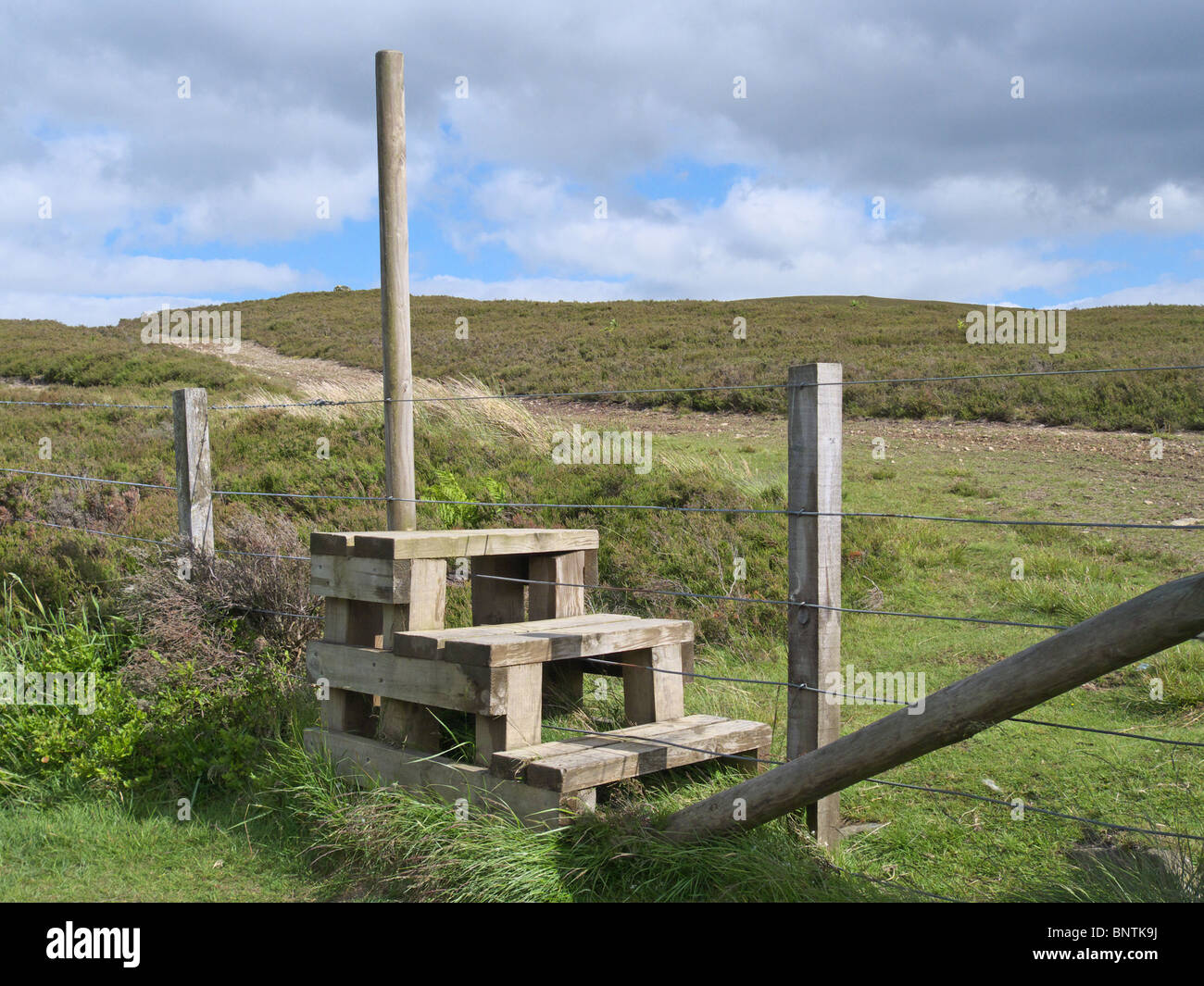 Close Up Of A Wooden Stile Over a Post and Wire Fence Stock Photo - Alamy