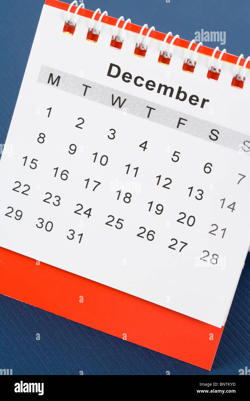 Calendar December close up with blue background Stock Photo - Alamy