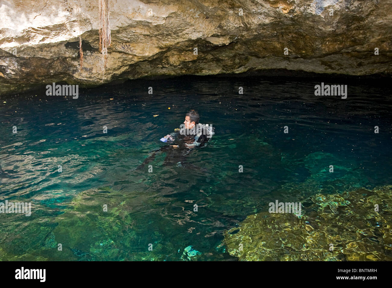 Scuba diving into Chac Mool, one of the cave systems on the Yucatan ...