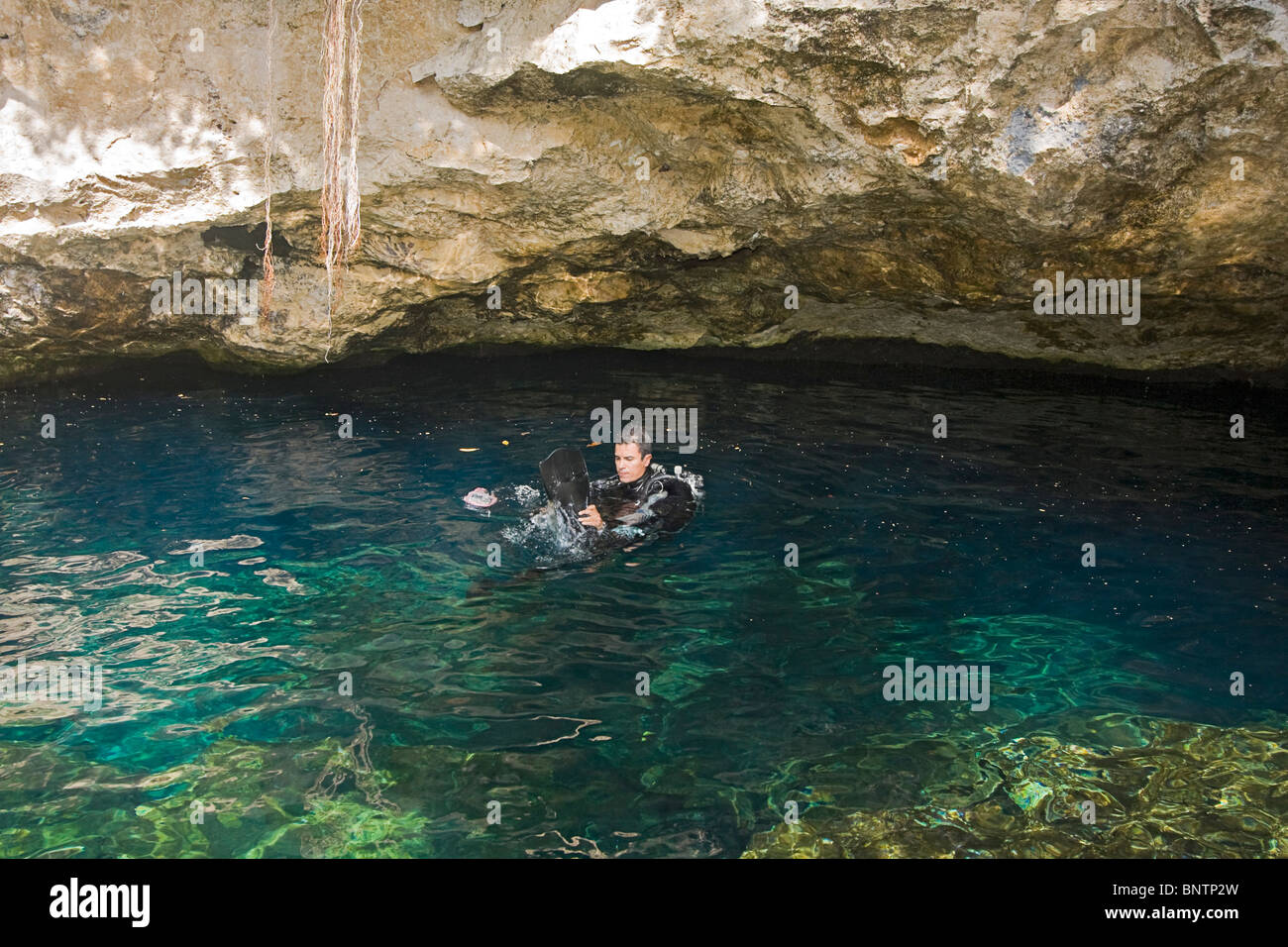 Scuba diving into Chac Mool, one of the cave systems on the Yucatan ...