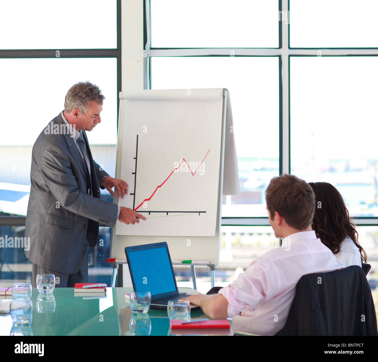 Senior businessman reporting to sales in a presentation Stock Photo - Alamy