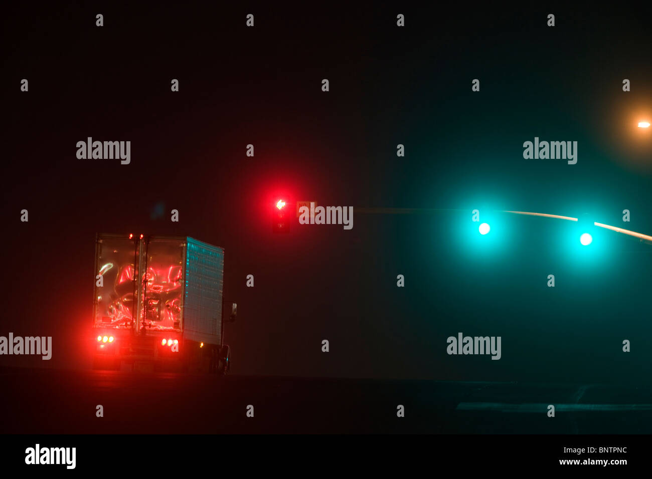 Tractor trailer stops red turn hi-res stock photography and images - Alamy