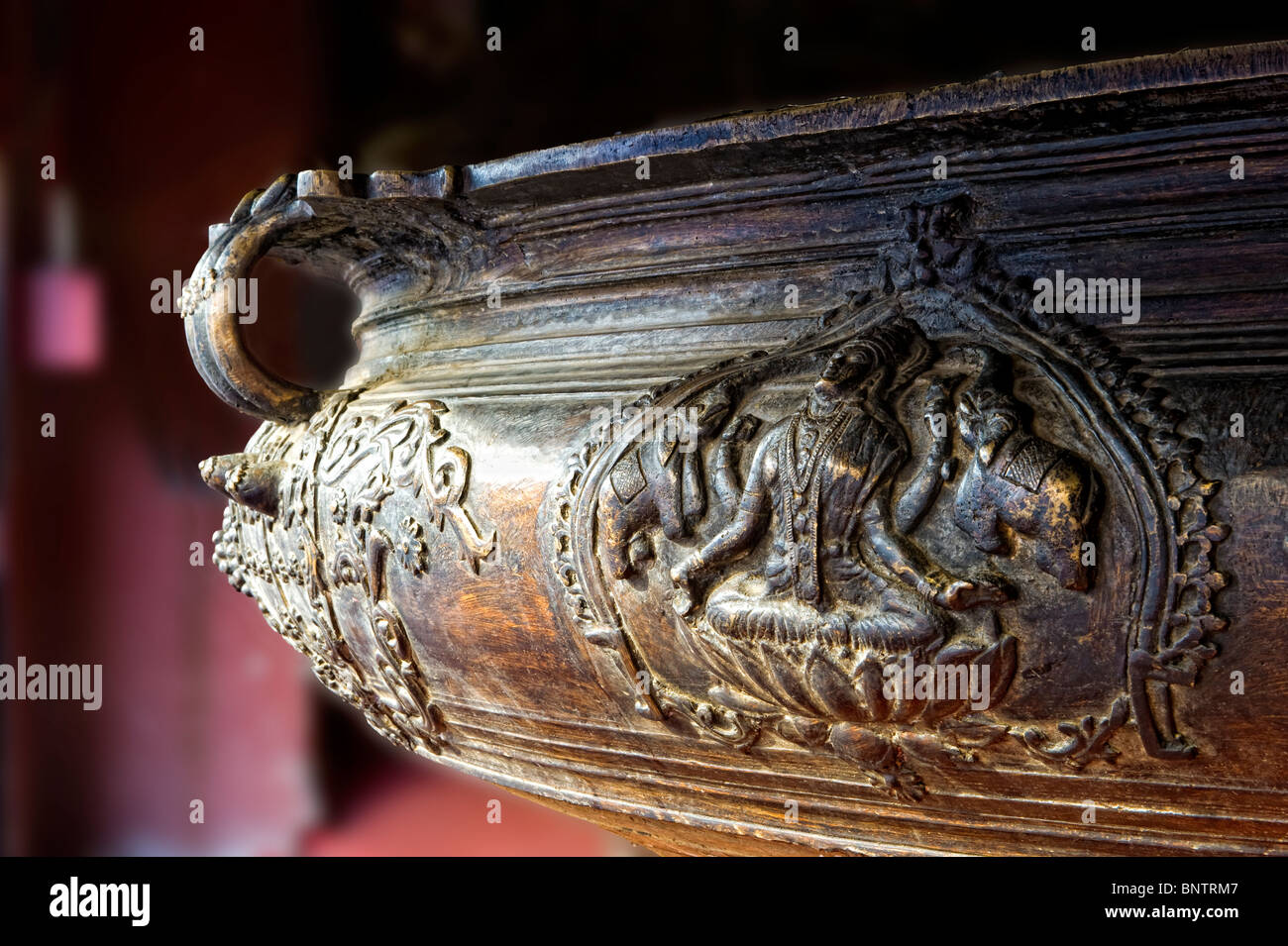 ancient Urli bowl with relief religious carvings Stock Photo - Alamy