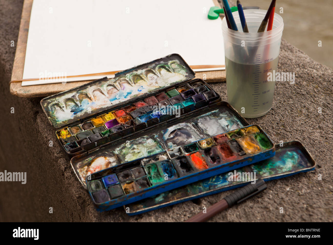 Paints With Blank Sheet of Paper Stock Photo - Alamy