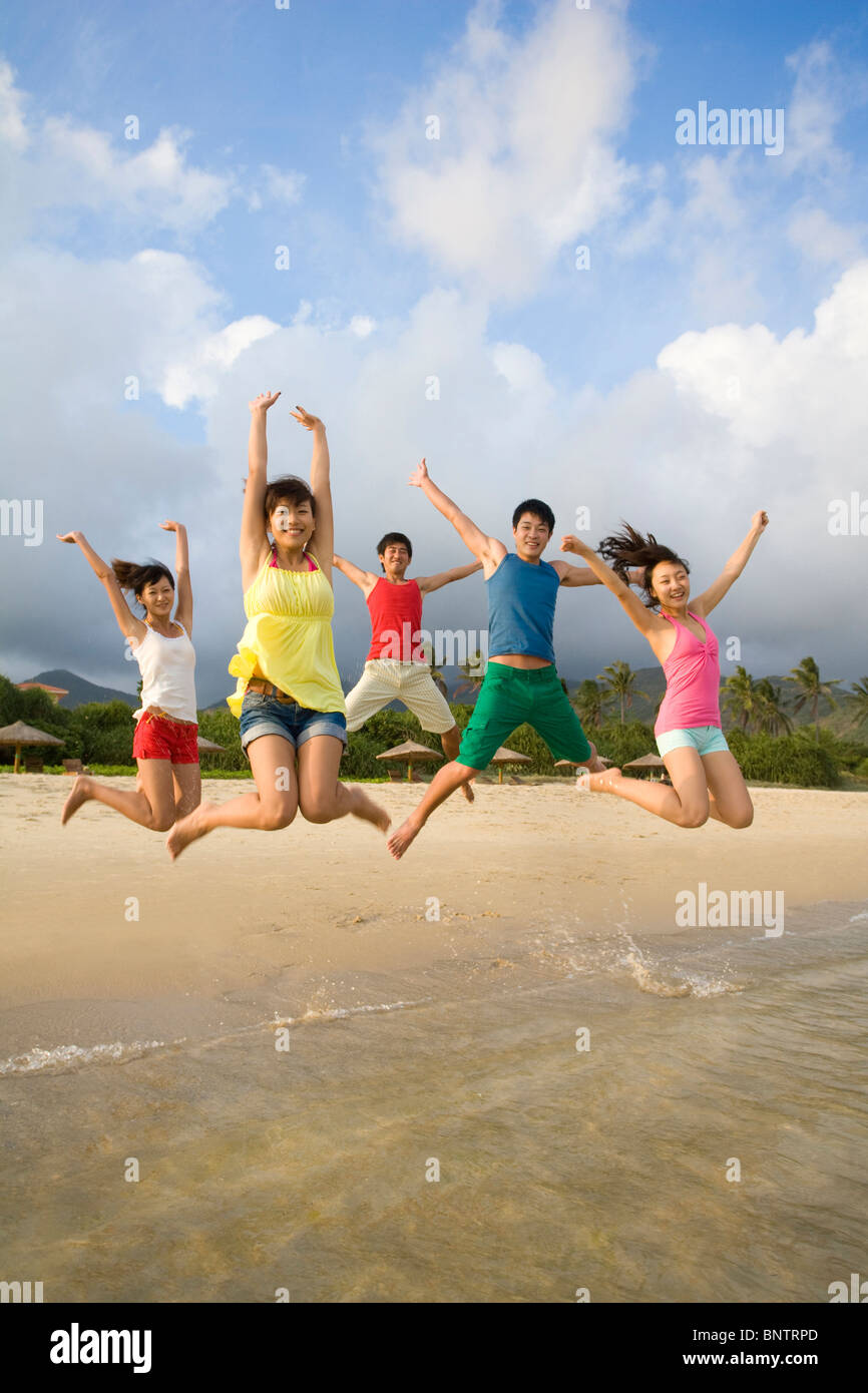 Friends having fun at the beach Stock Photo - Alamy