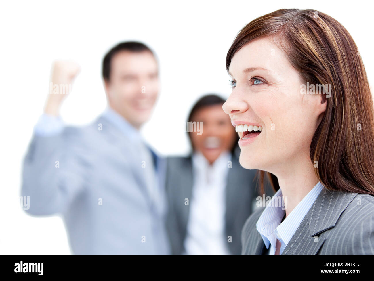 Successful business team looking at the camera Stock Photo - Alamy